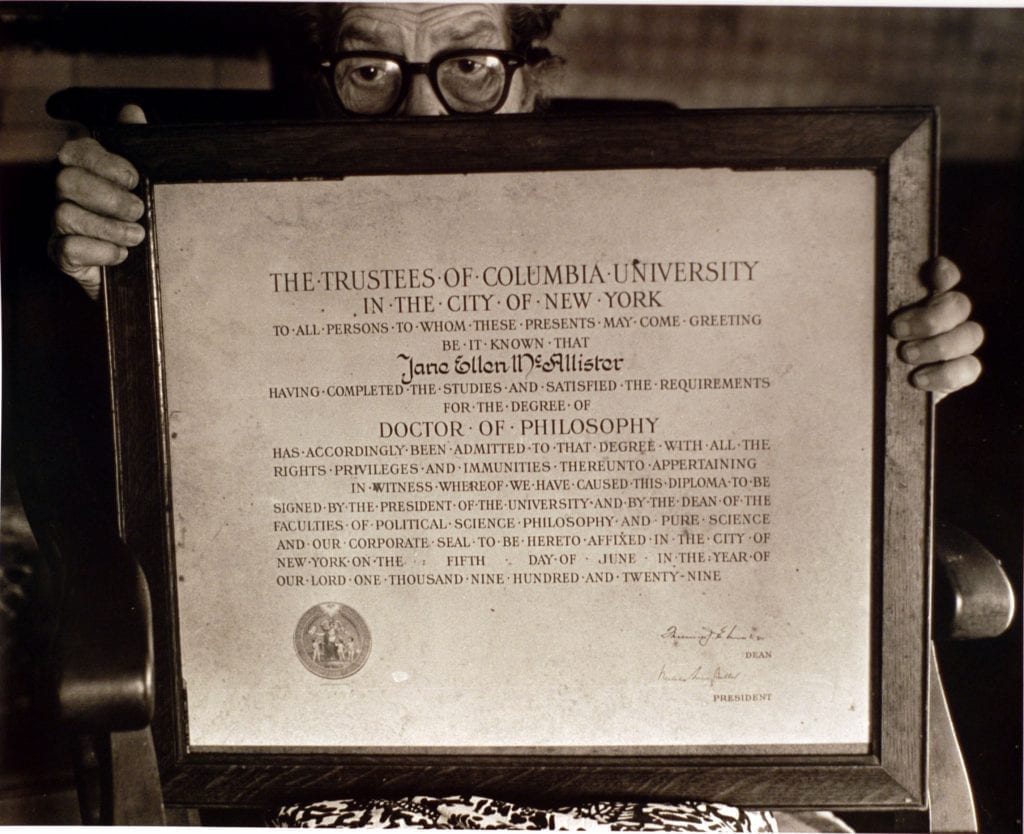 Holding her diploma from Columbia University - Ogden Museum of Southern Art